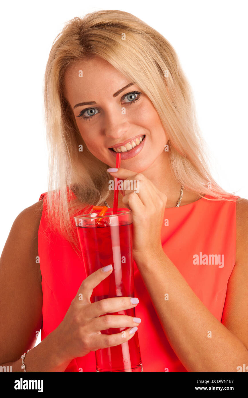Beautiful young woman in red dress with a glass of ice tea isolated ...