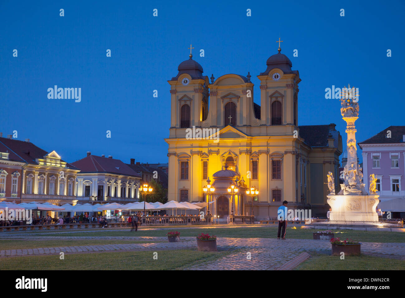 Roman Catholic Cathedral and Trinity Column in Piata Unirii at dusk ...