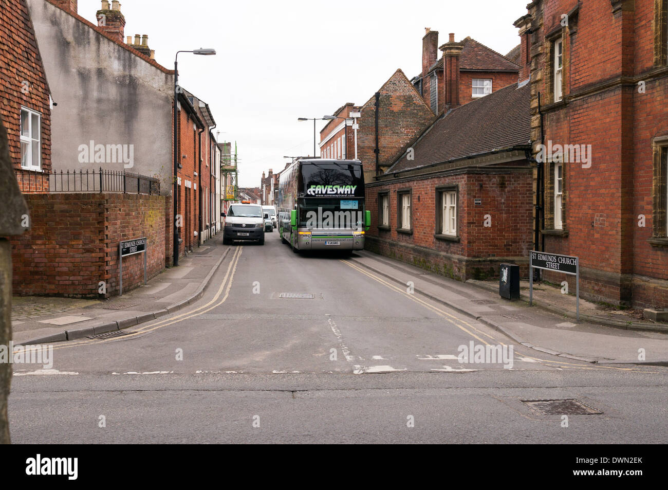 Large tour bus parked illegally and causing an obstruction in a narrow ...