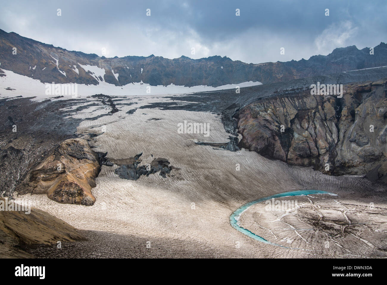 Blue glacial water in a glacier on Mutnovsky volcano, Kamchatka, Russia ...