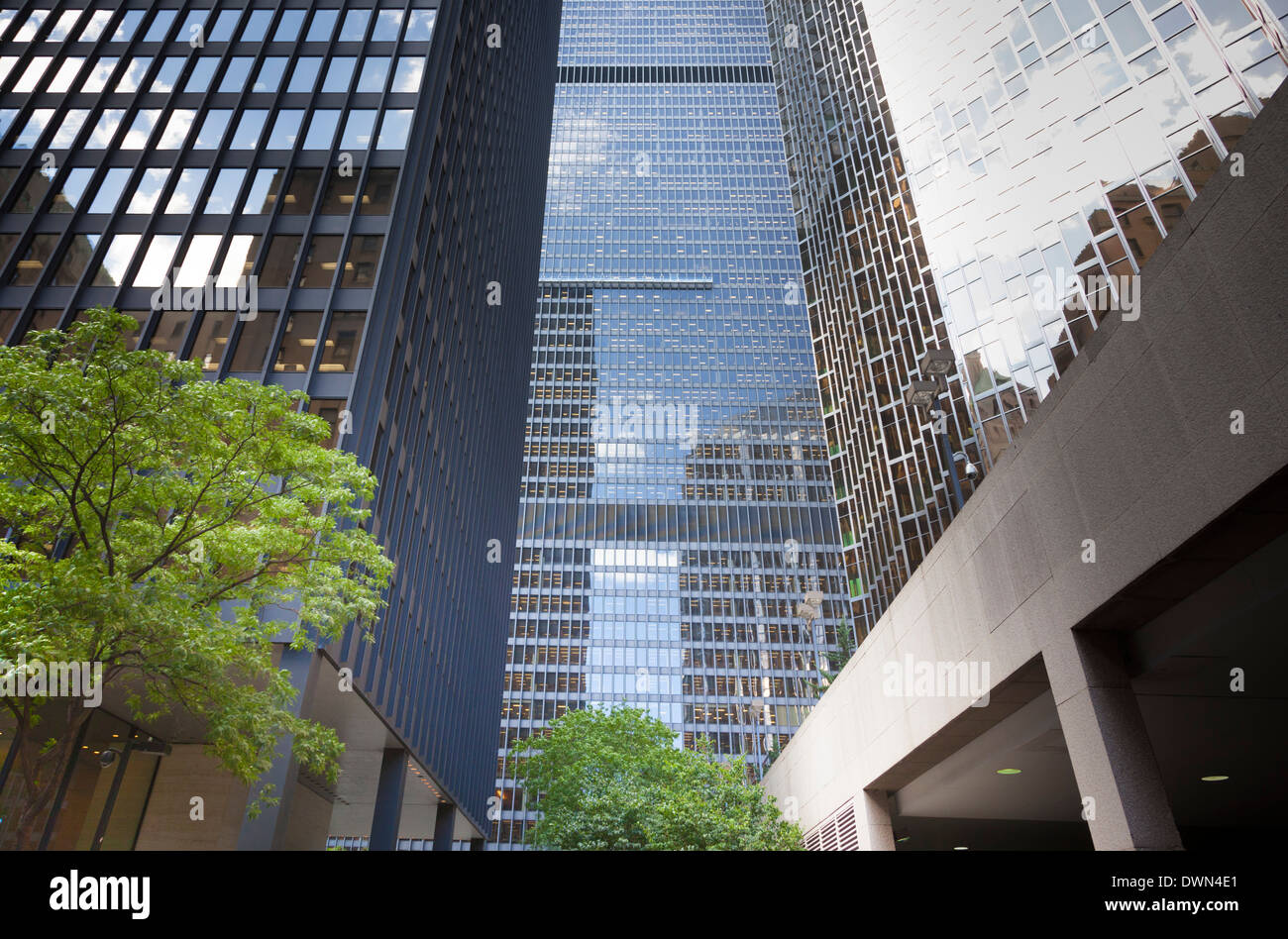 Looking up at the high rise buildings of the business district in down ...