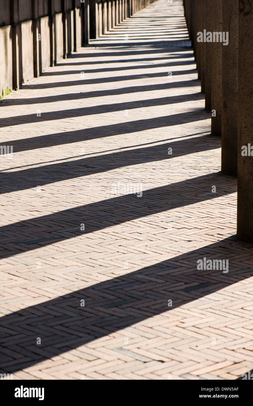Harsh shadows through arches Stock Photo - Alamy