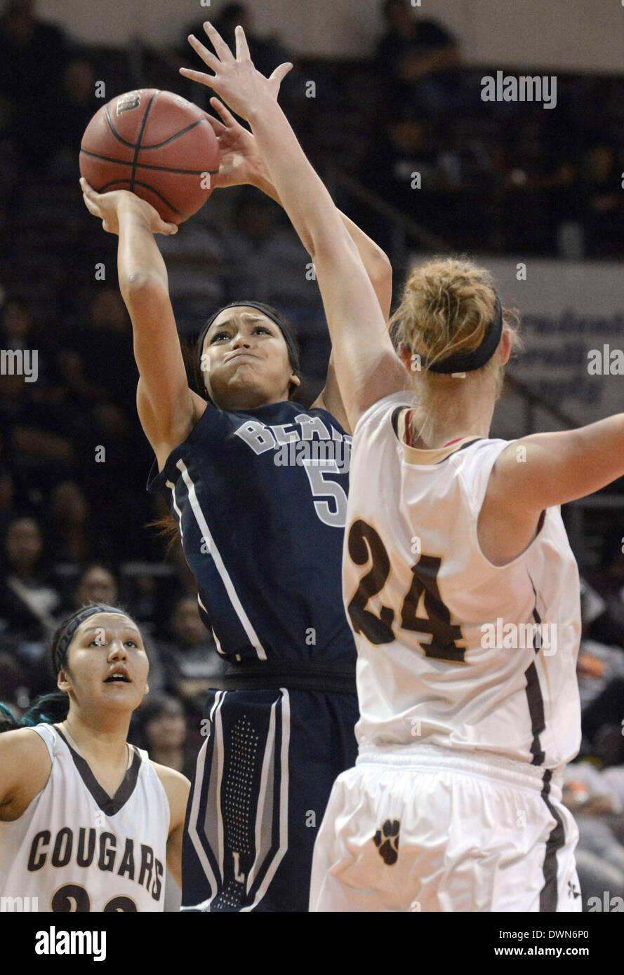 Usa. 11th Mar, 2014. SPORTS -- La Cueva's Alexa Romano, 5, shoots over ...