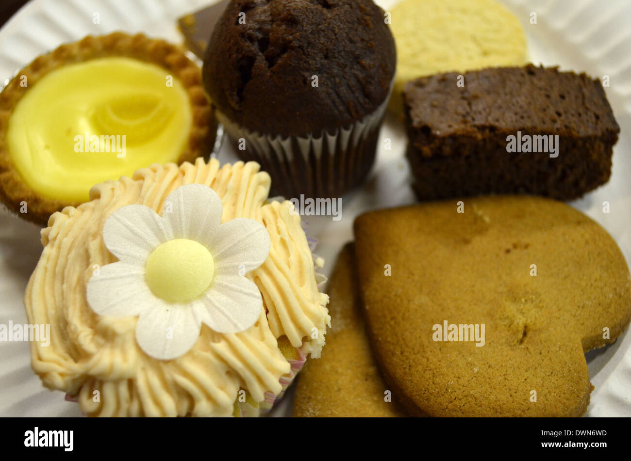 Very tasty home-baked cakes on a plate Stock Photo - Alamy