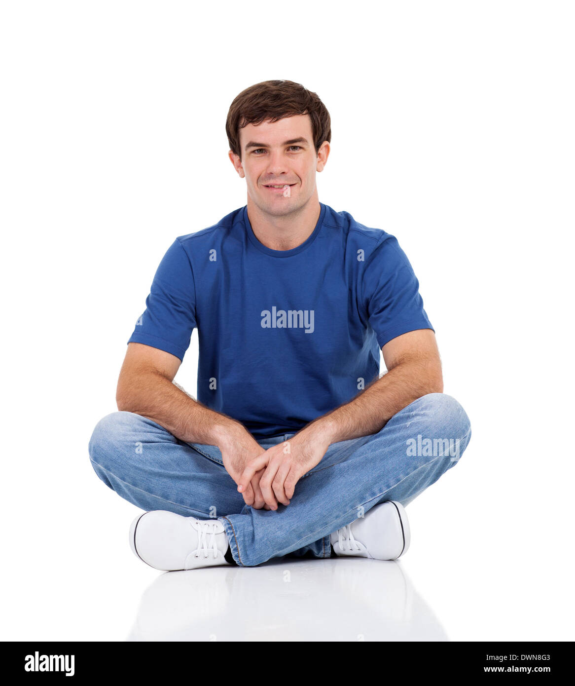 portrait of cute man sitting on white background Stock Photo - Alamy