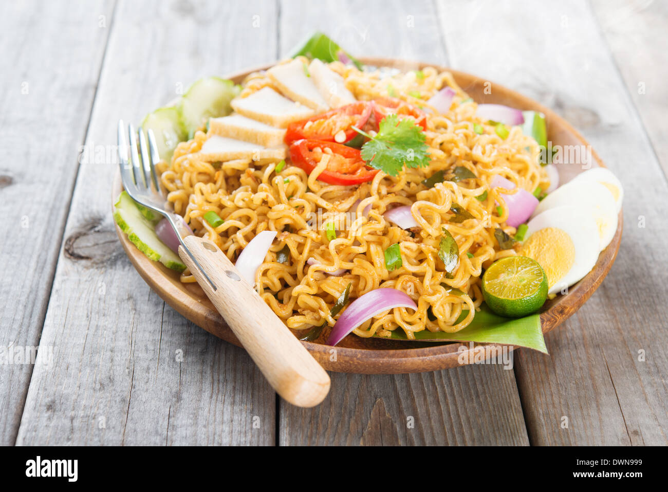 Spicy fried curry instant noodles or Malaysian style maggi goreng mamak ...