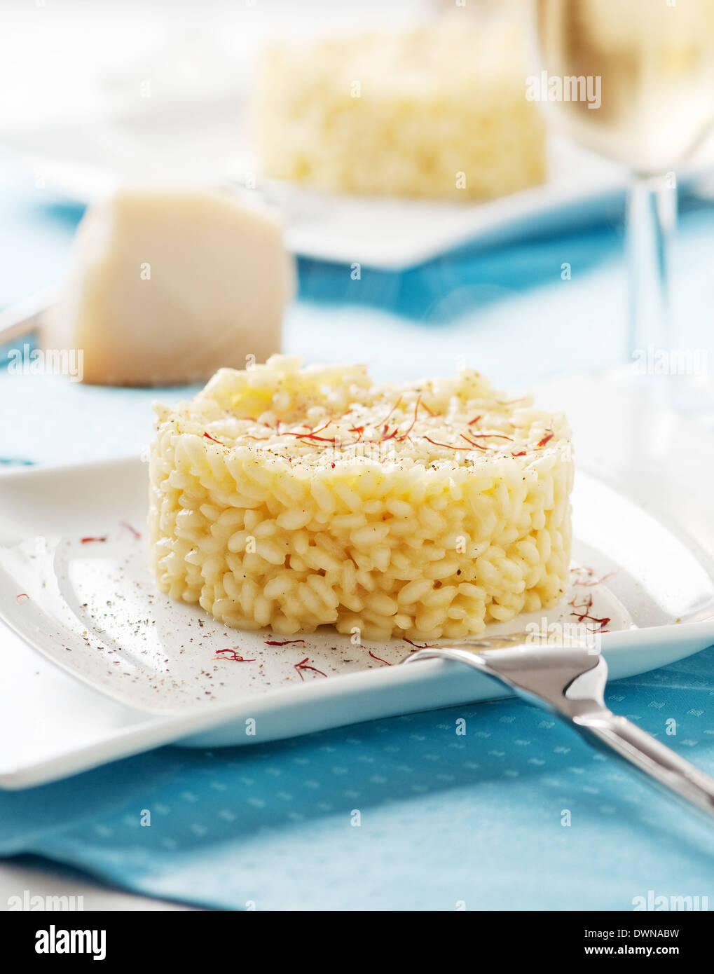 Traditional Italian risotto with saffron and white wine, selective ...