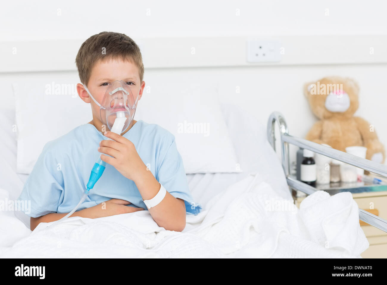 Boy wearing oxygen mask in hospital Stock Photo - Alamy