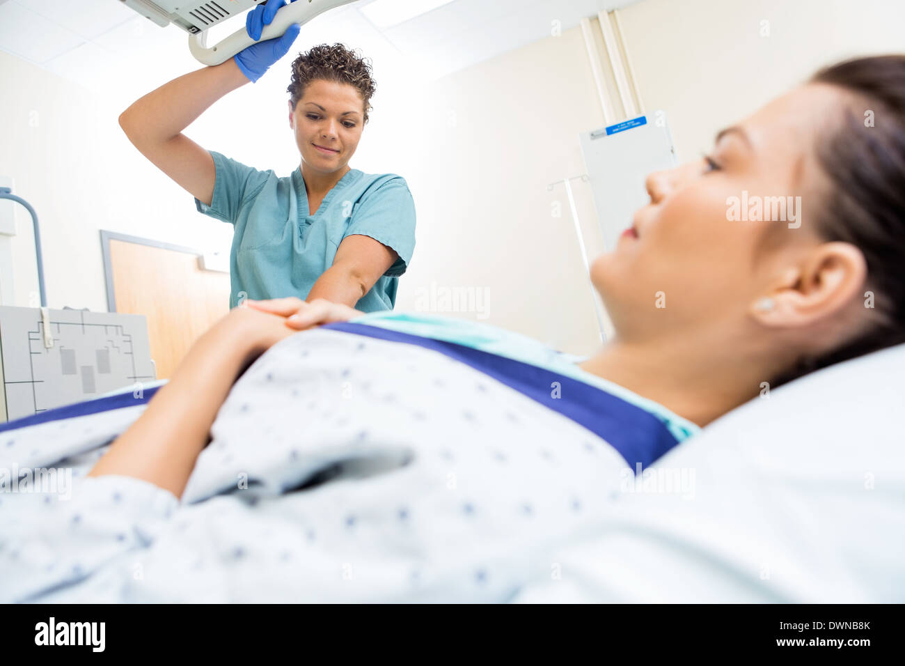 Nurse Preparing Patient For Xray Stock Photo - Alamy