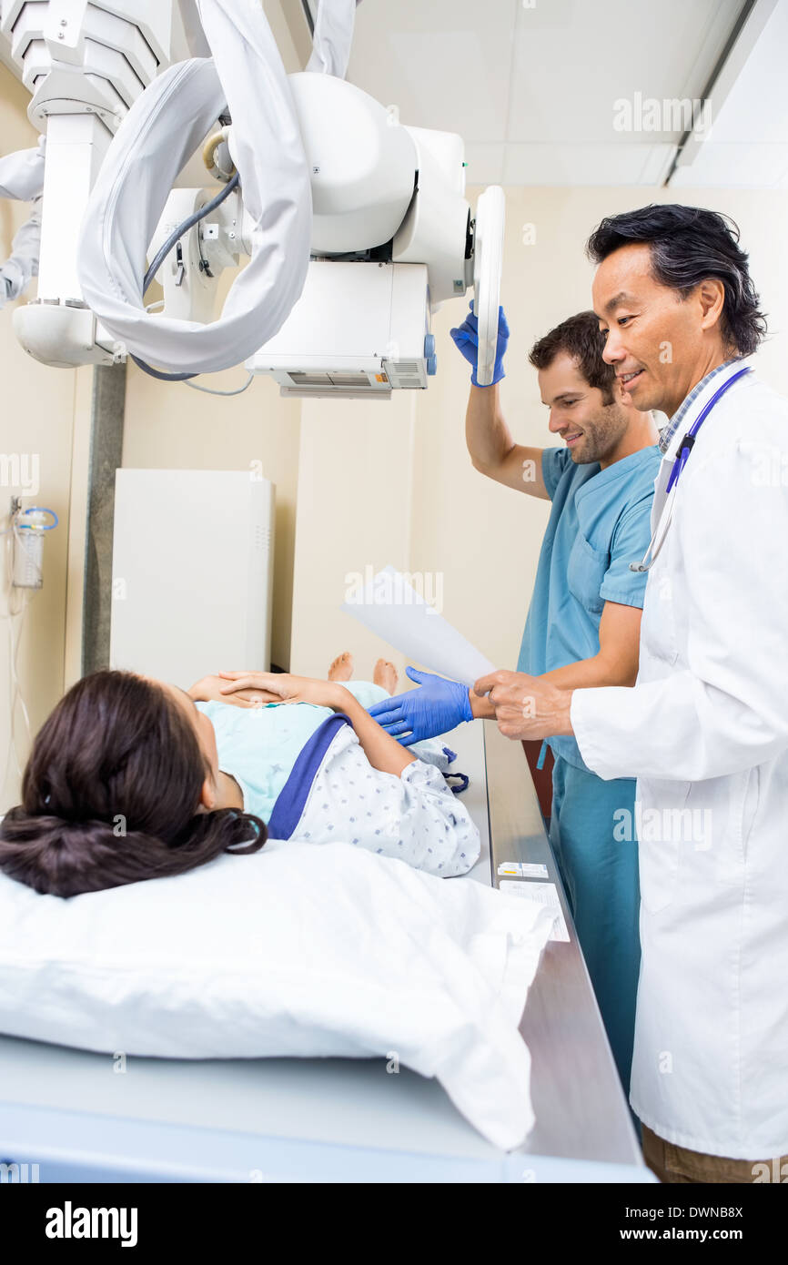 Medical Team Preparing Patient For Xray Stock Photo - Alamy