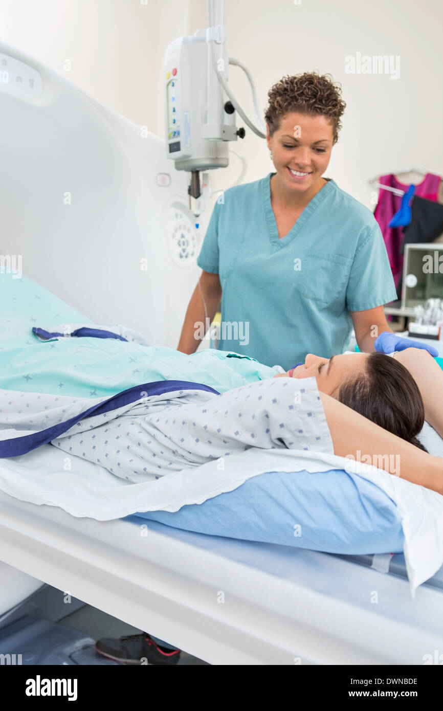 Nurse Preparing Patient For CT Scan Stock Photo - Alamy