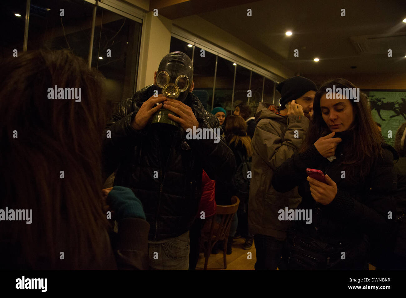 People take shelter at a coffee shop as nationwide protests lead to ...
