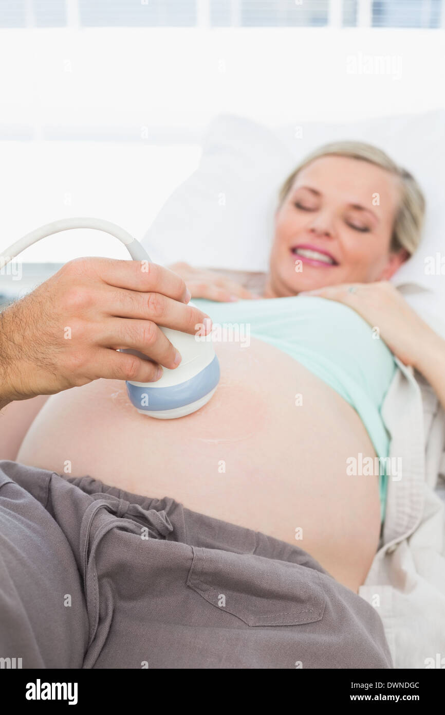 Pregnant woman having medical examination hi-res stock photography and ...