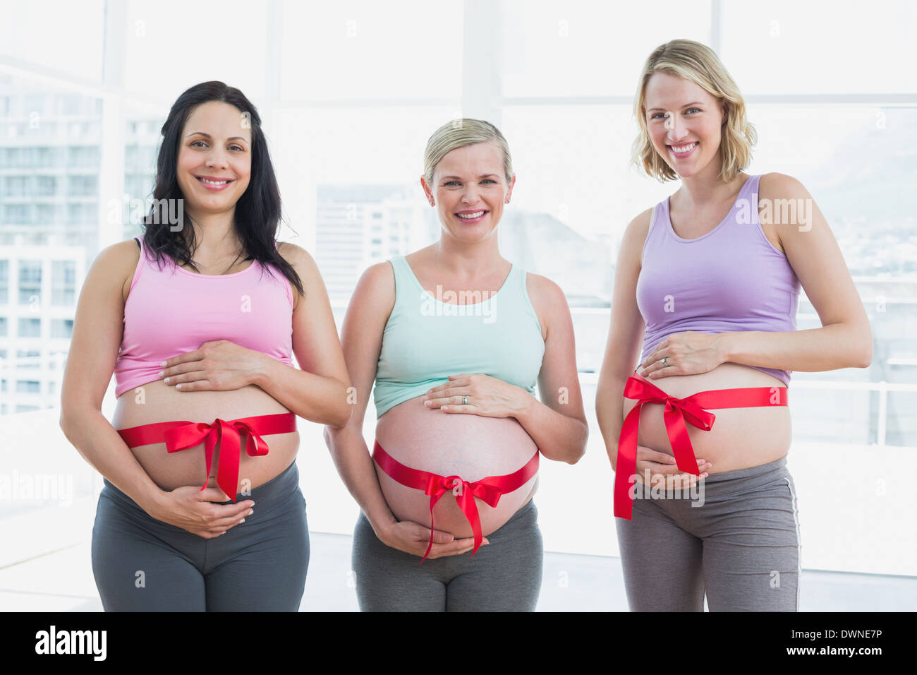 Pregnant belly and bow hi-res stock photography and images - Alamy