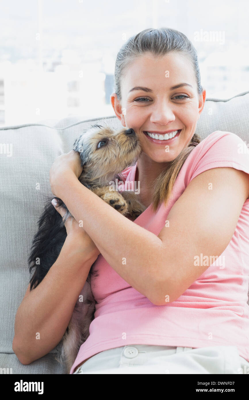 Woman cuddling dog indoors cute hi-res stock photography and images - Alamy