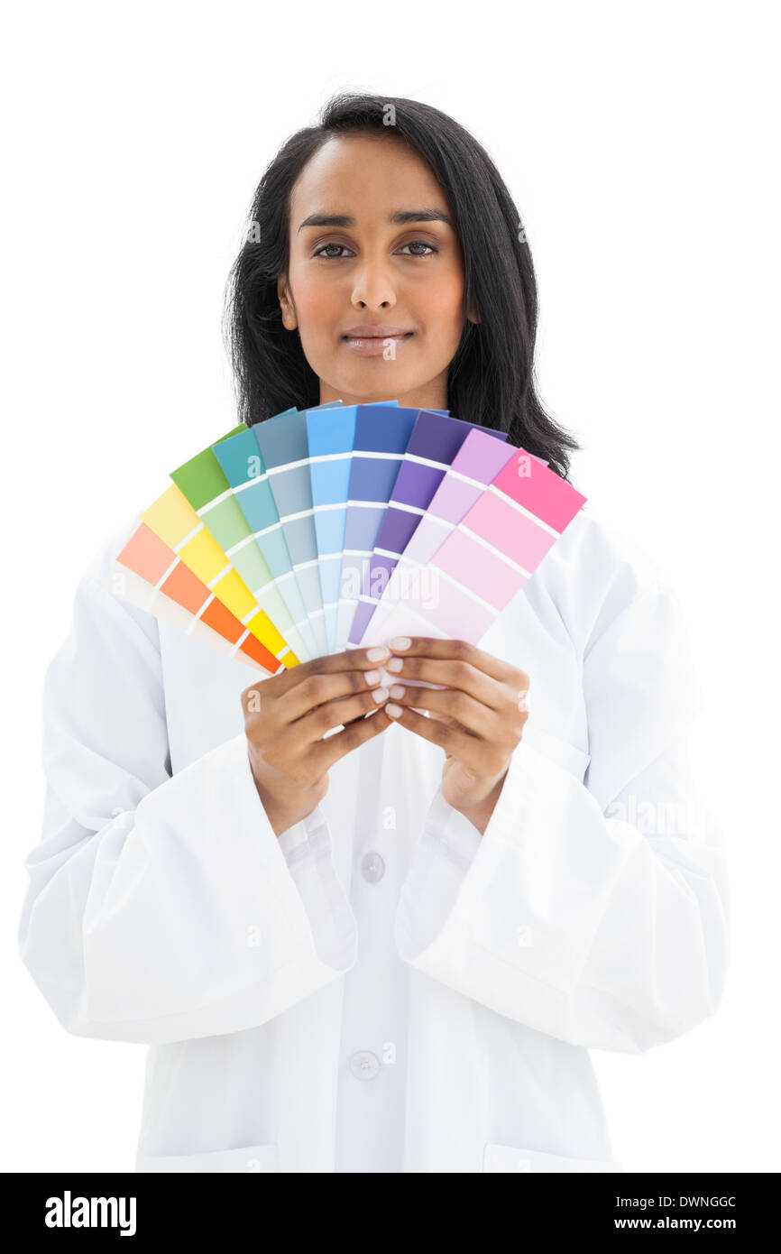 Portrait of a young woman with paint samples Stock Photo - Alamy