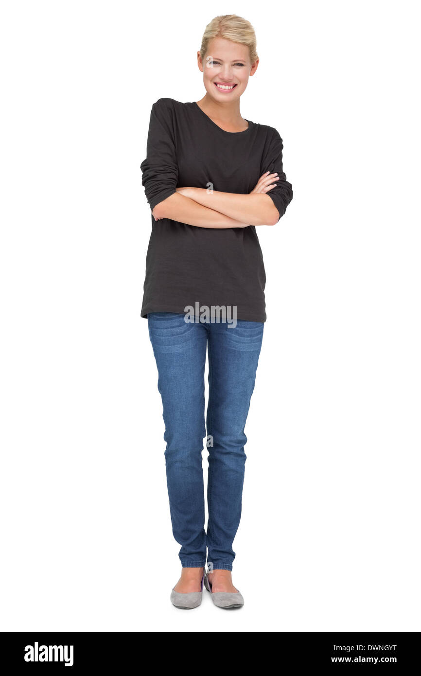 Full length portrait of a smiling young woman Stock Photo - Alamy