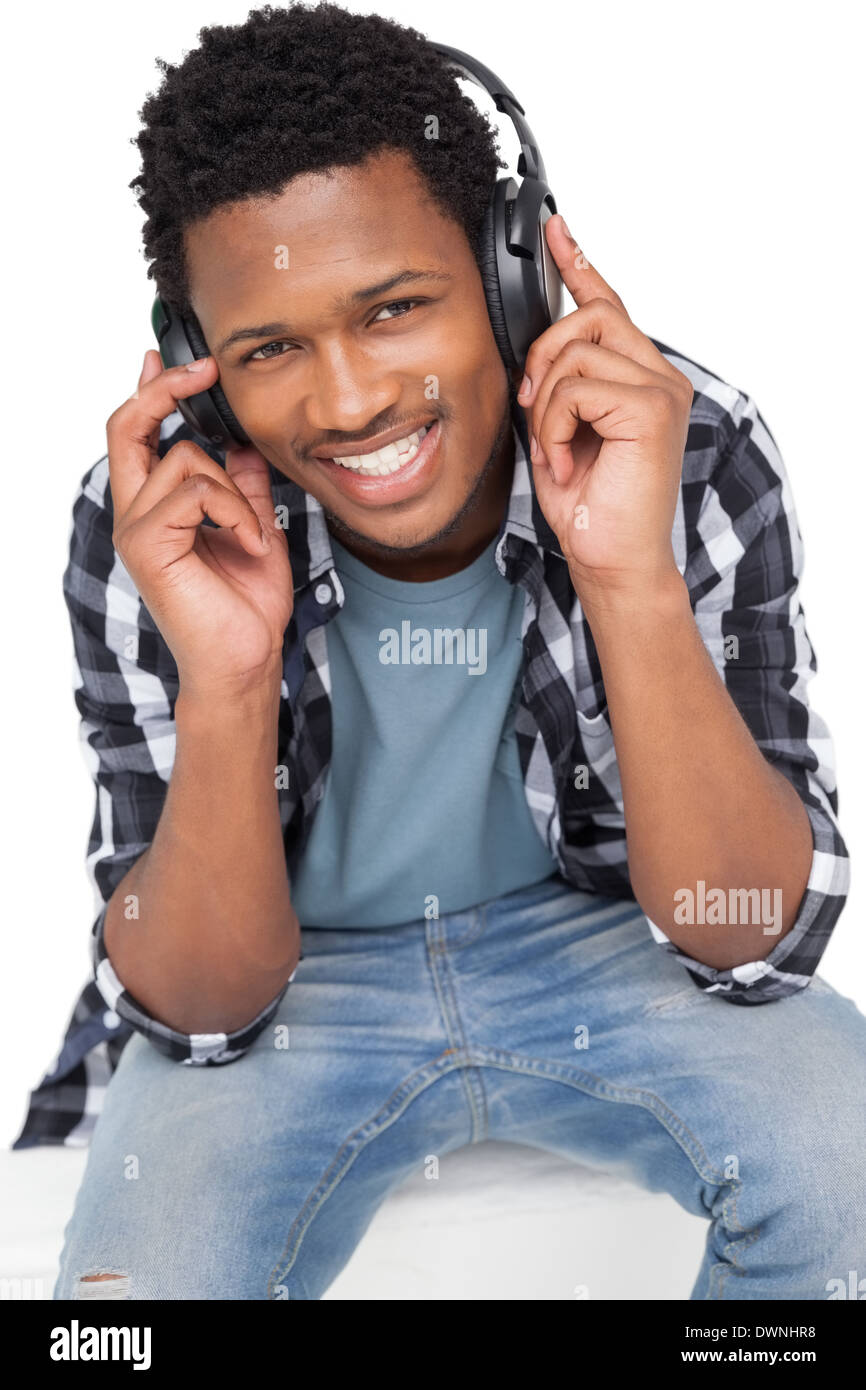 Portrait of a young man enjoying music Stock Photo - Alamy