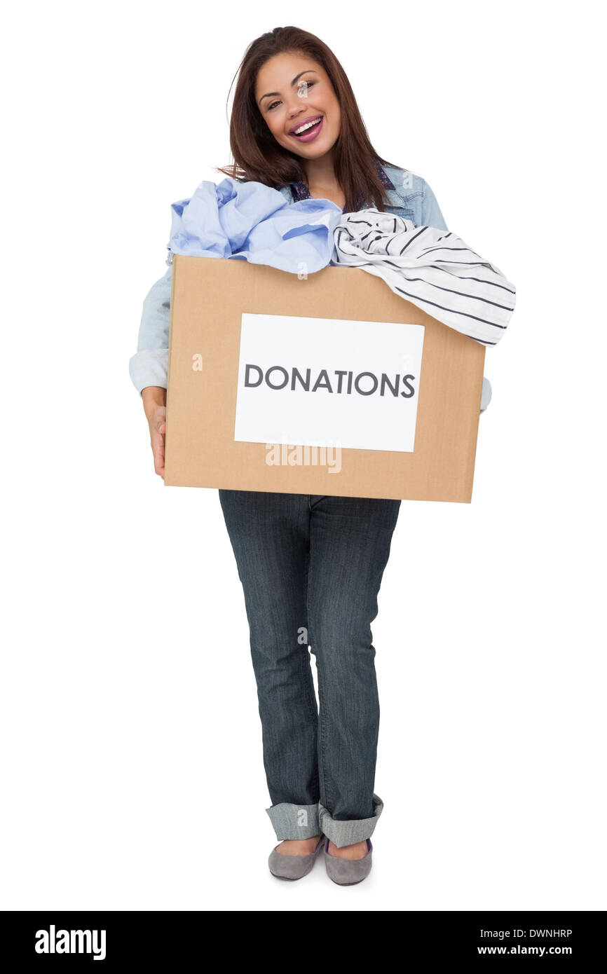 Portrait of a young woman with clothes donation Stock Photo - Alamy