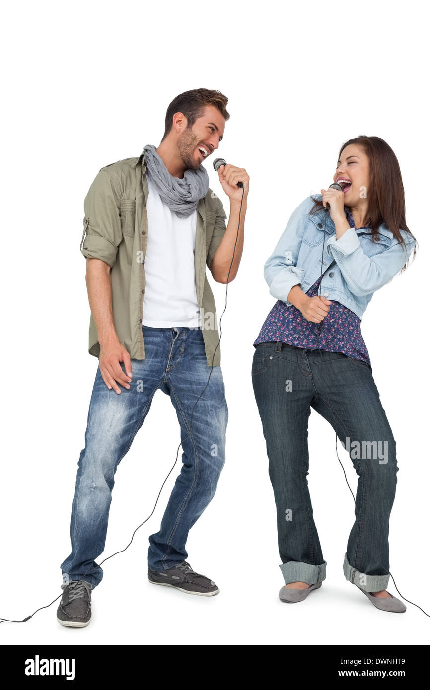 Couple holding microphone hi-res stock photography and images - Alamy
