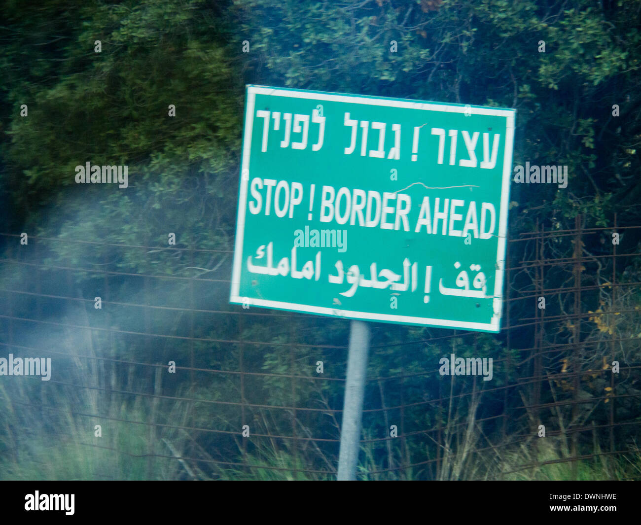 Trilingual sign warns of approaching the Israeli-Lebanese border where ...