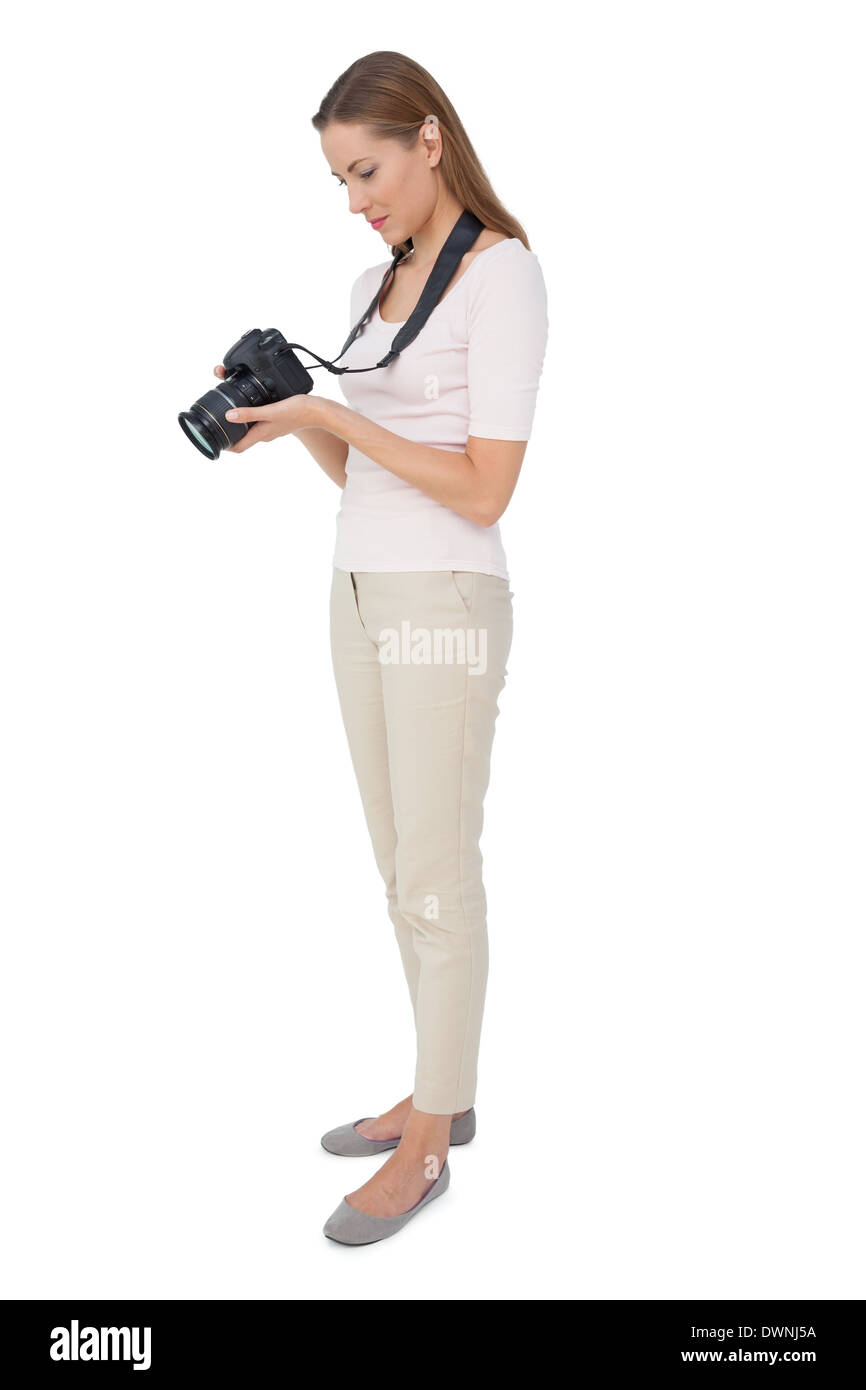 Side view of a beautiful female photographer Stock Photo - Alamy