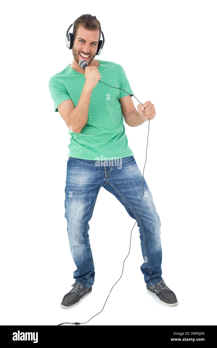Portrait young man singing microphone hi-res stock photography and images - Alamy