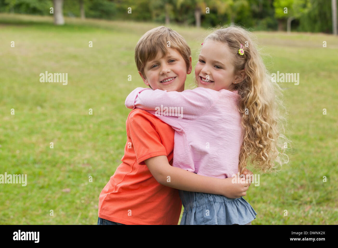 Kids hugging hi-res stock photography and images - Alamy