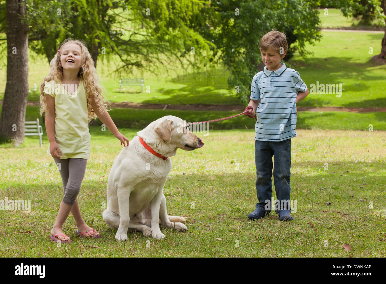 Two kids and dog hi-res stock photography and images - Alamy