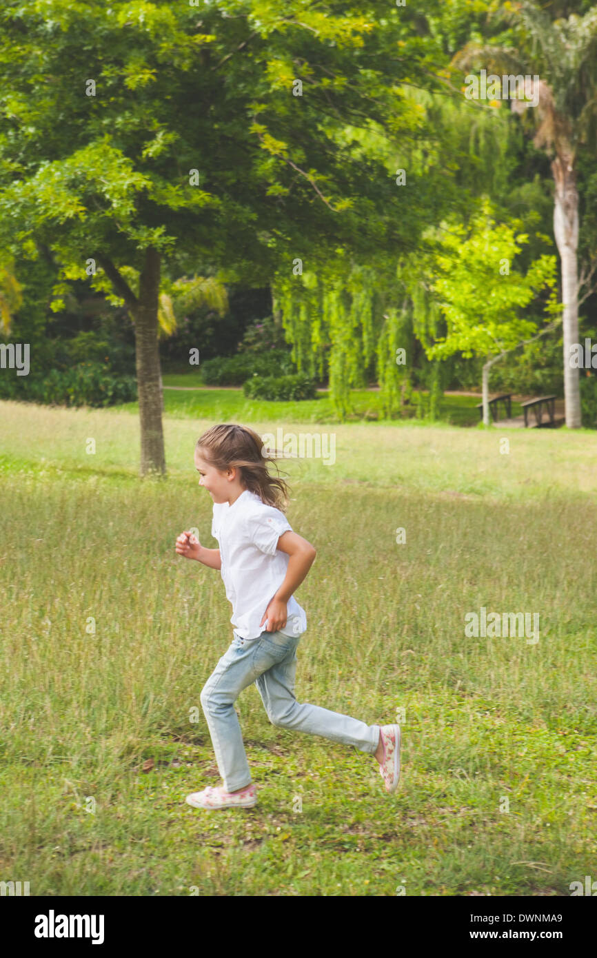 Girl running park hi-res stock photography and images - Alamy