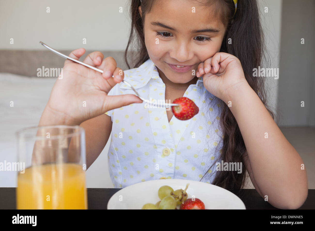 Girl eating fruits hi-res stock photography and images - Alamy