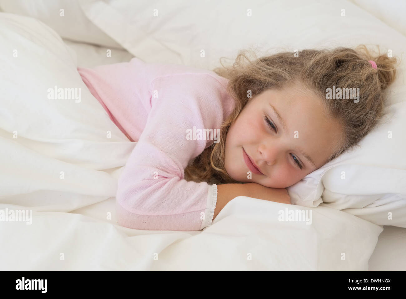 Cute girl sleeping bed hi-res stock photography and images - Alamy