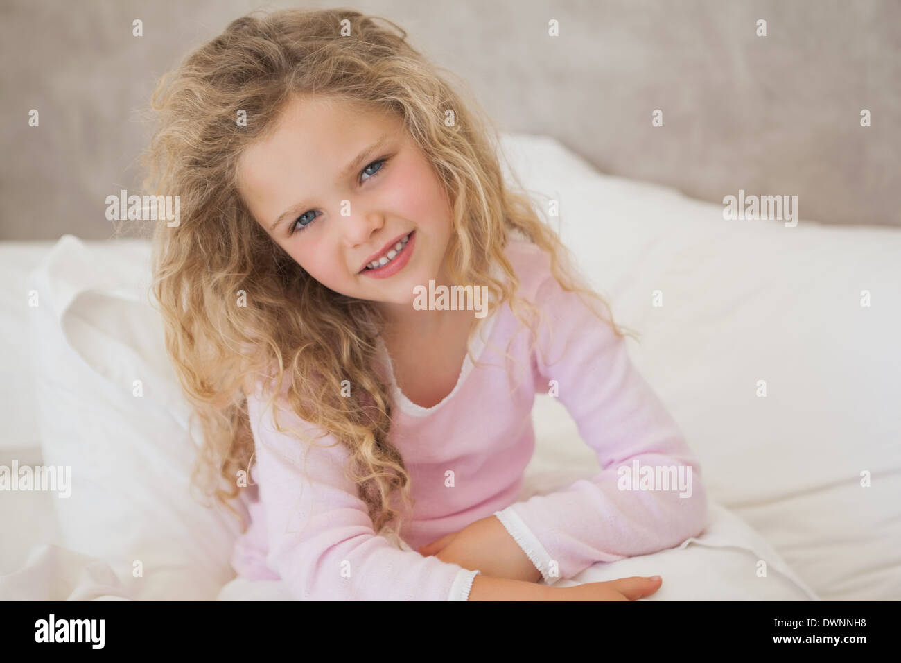 Portrait smiling girl sitting hi-res stock photography and images - Alamy