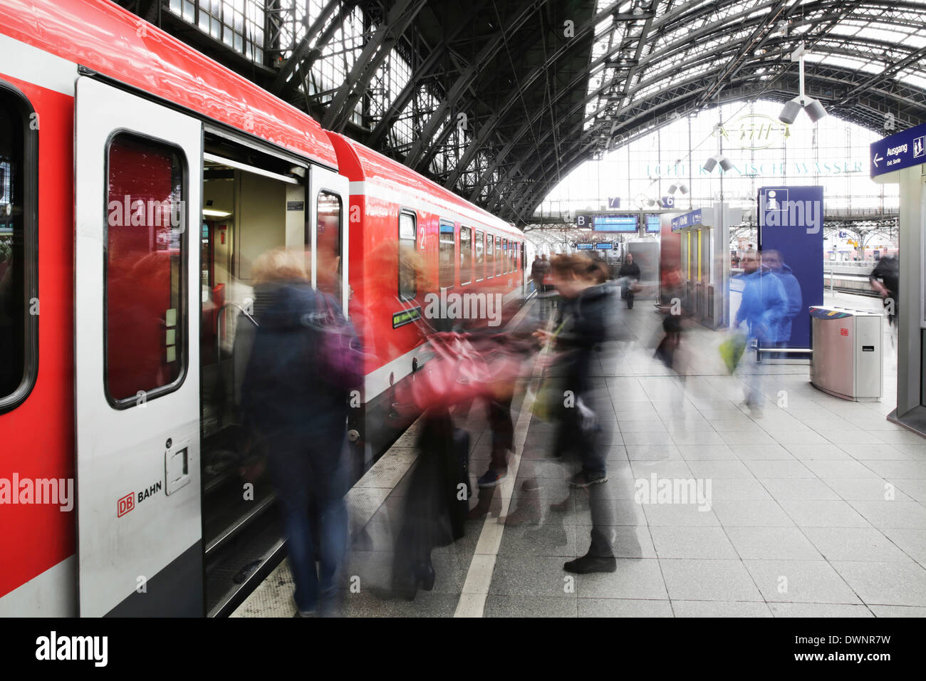 People boarding a train, platform at Cologne Central Railway Station or ...