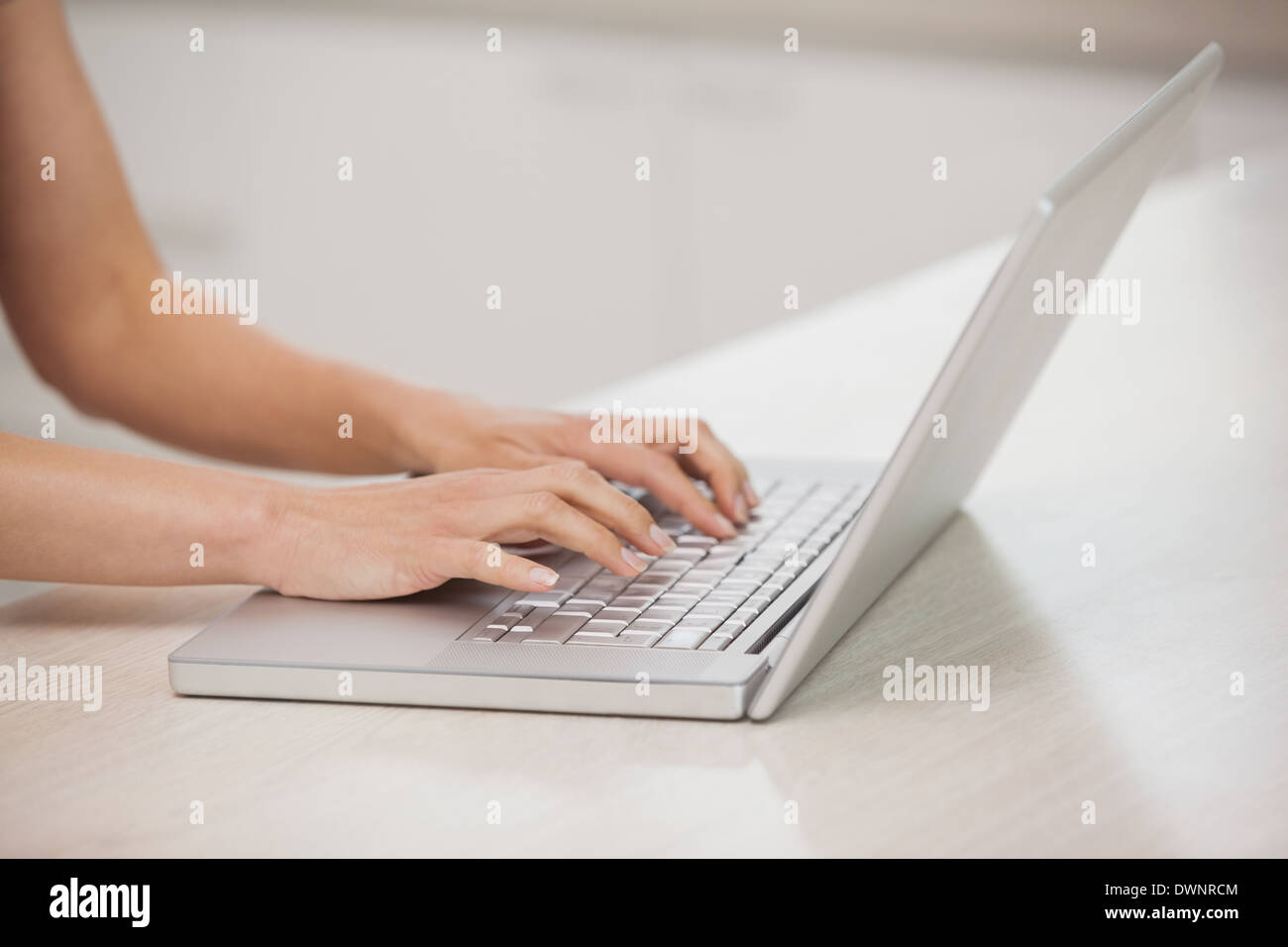 Side view hands typing hi-res stock photography and images - Alamy