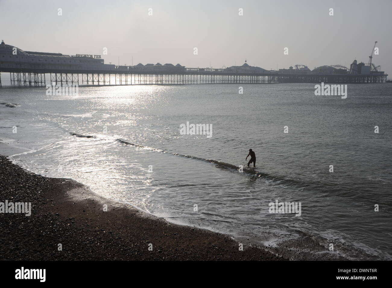 Swimmer walking out of the sea hi-res stock photography and images - Alamy