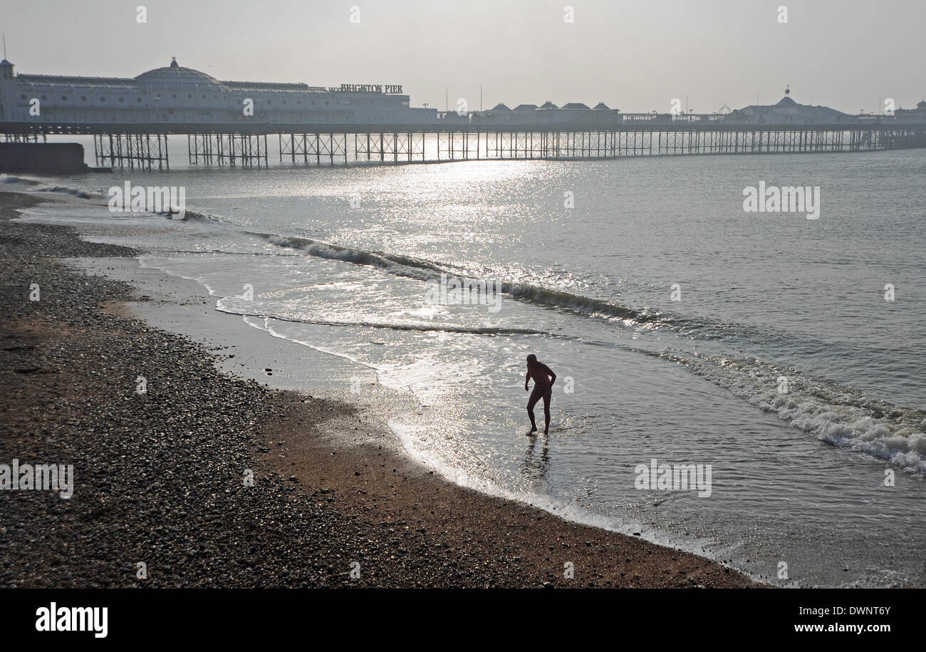 Swimmer walking out of the sea hi-res stock photography and images - Alamy