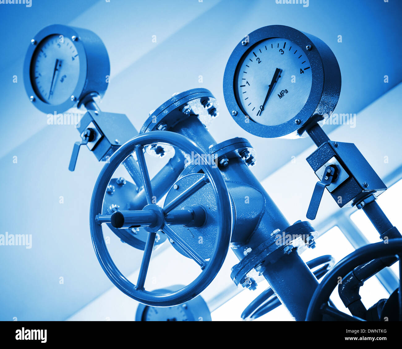Industrial valve and manometers on modern pipeline system Stock Photo ...