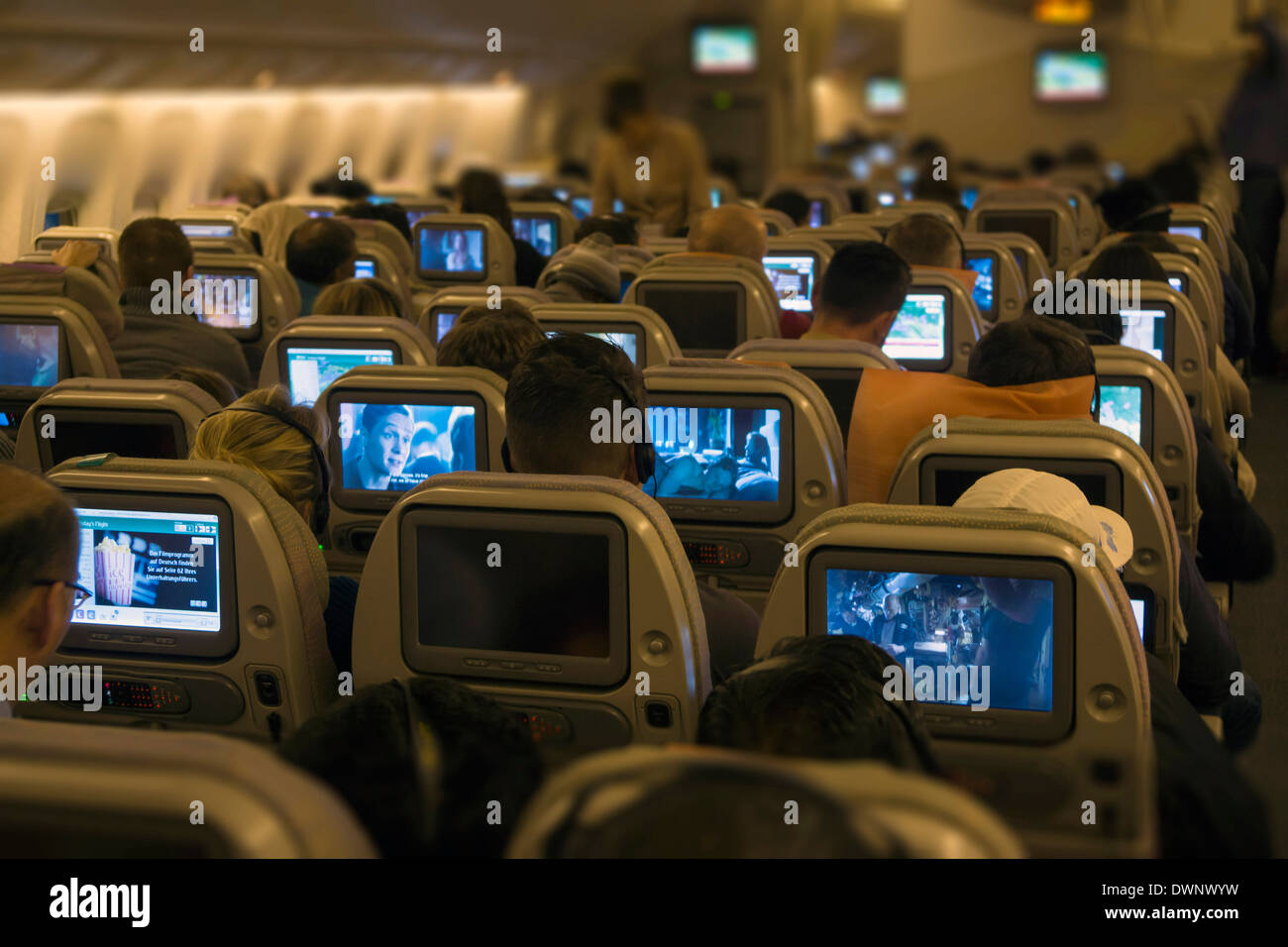 Entertainment in an aircraft Stock Photo - Alamy