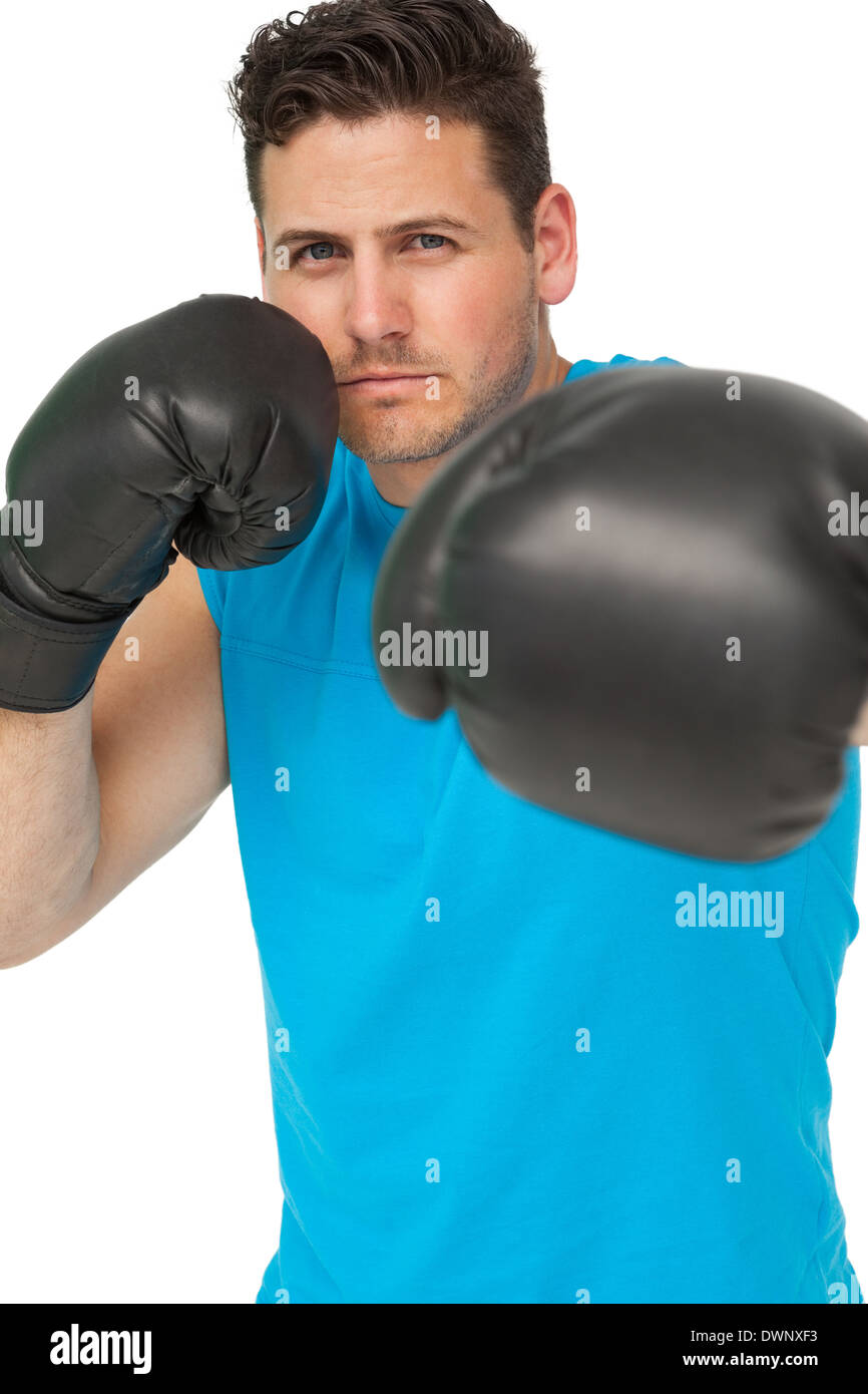 Determined male boxer focused on his training Stock Photo - Alamy