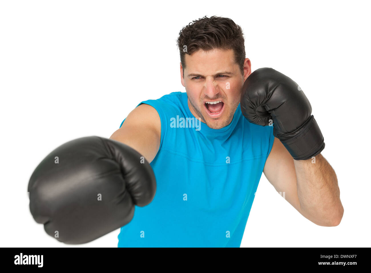Determined male boxer focused on his training Stock Photo - Alamy