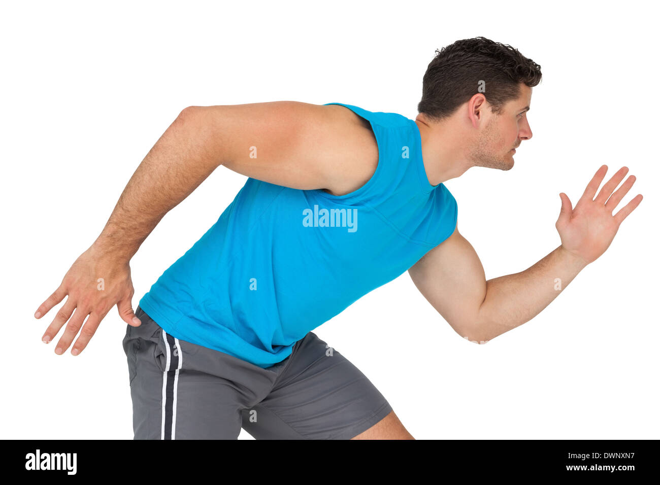 Side view of a young sporty man running Stock Photo - Alamy