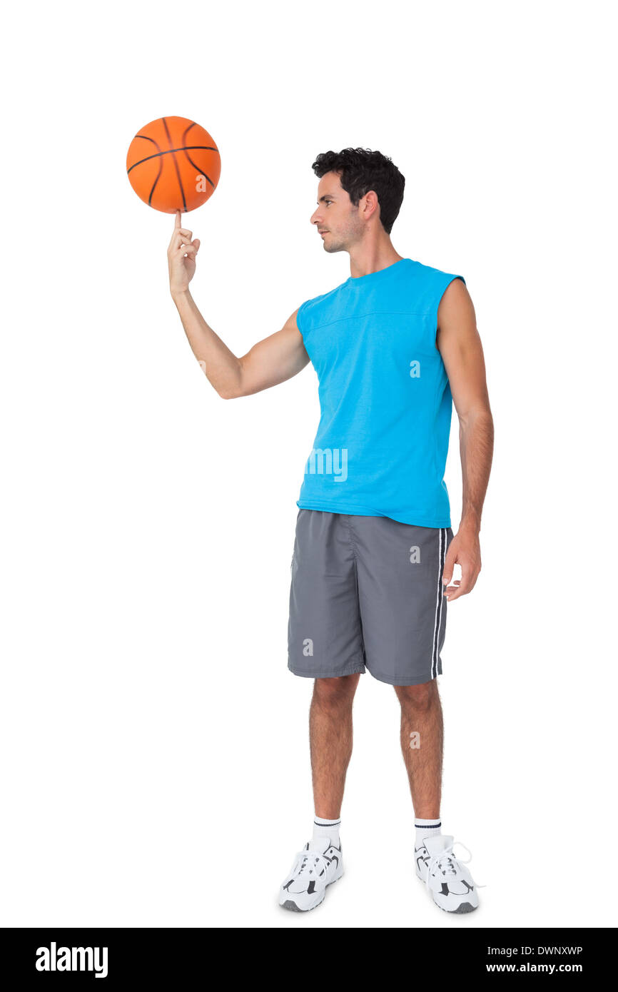 Full length of a basketball player with ball Stock Photo - Alamy