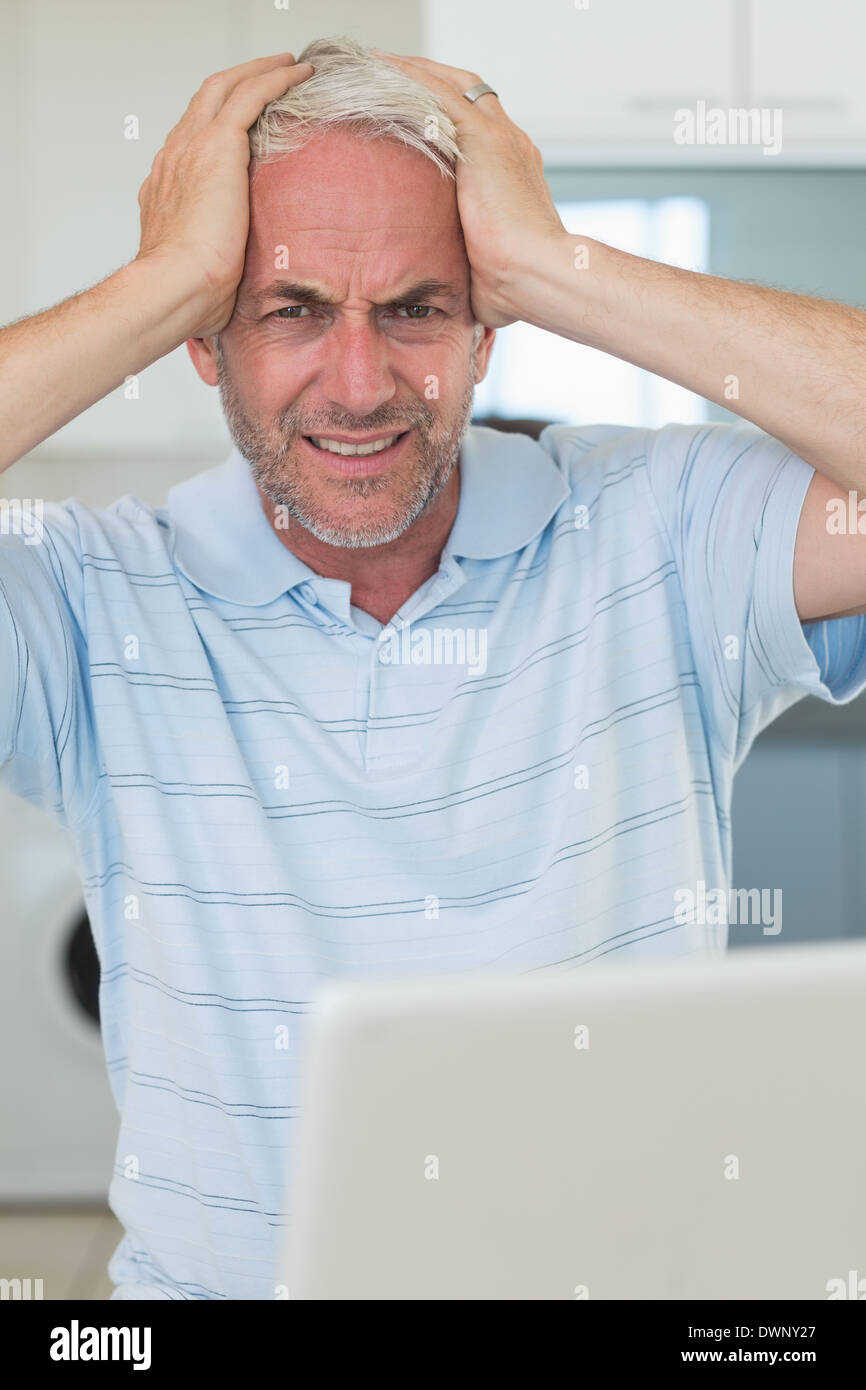 Man Stressed Looking At Laptop High Resolution Stock Photography and ...