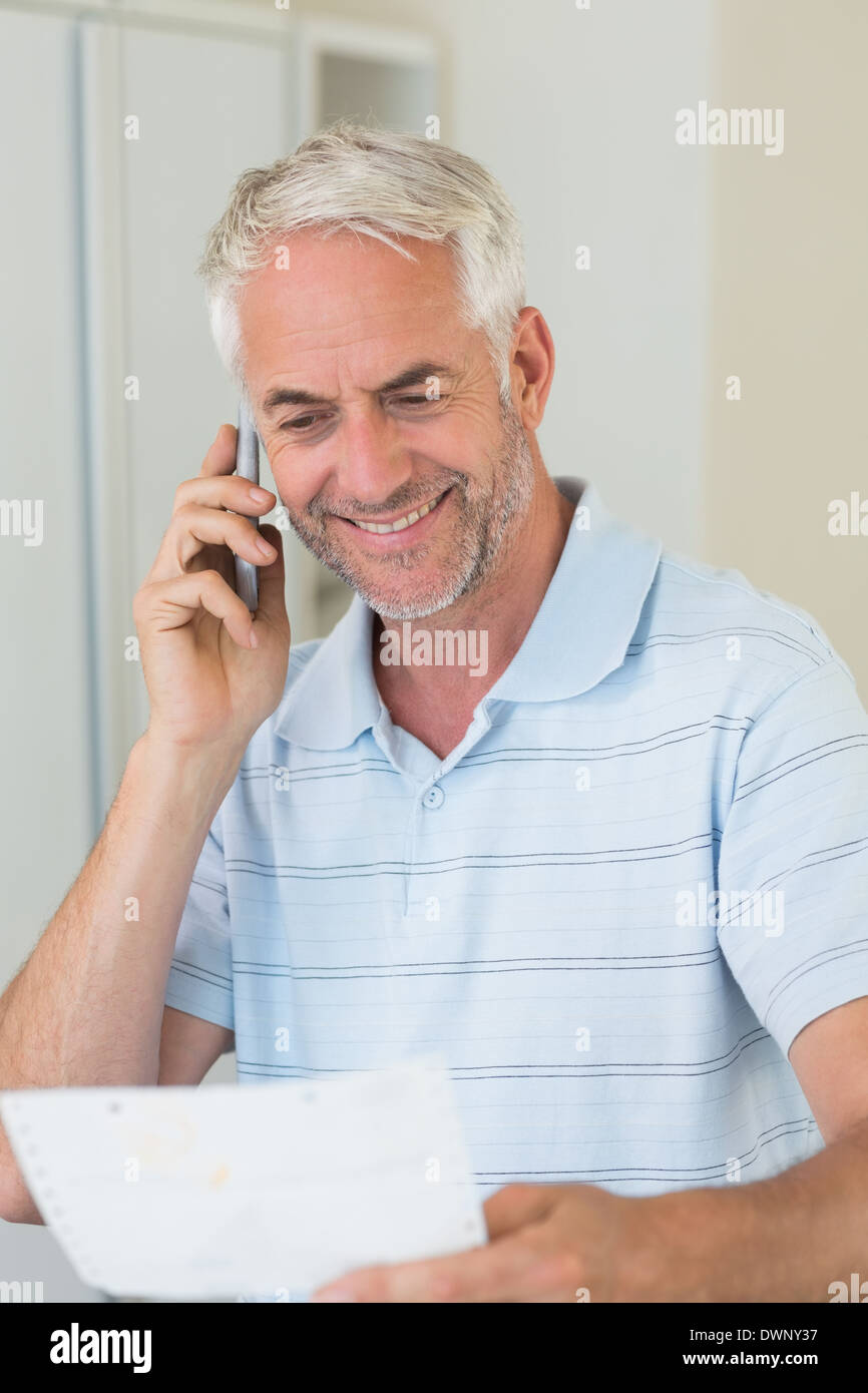 Smiling man on a phone call Stock Photo - Alamy