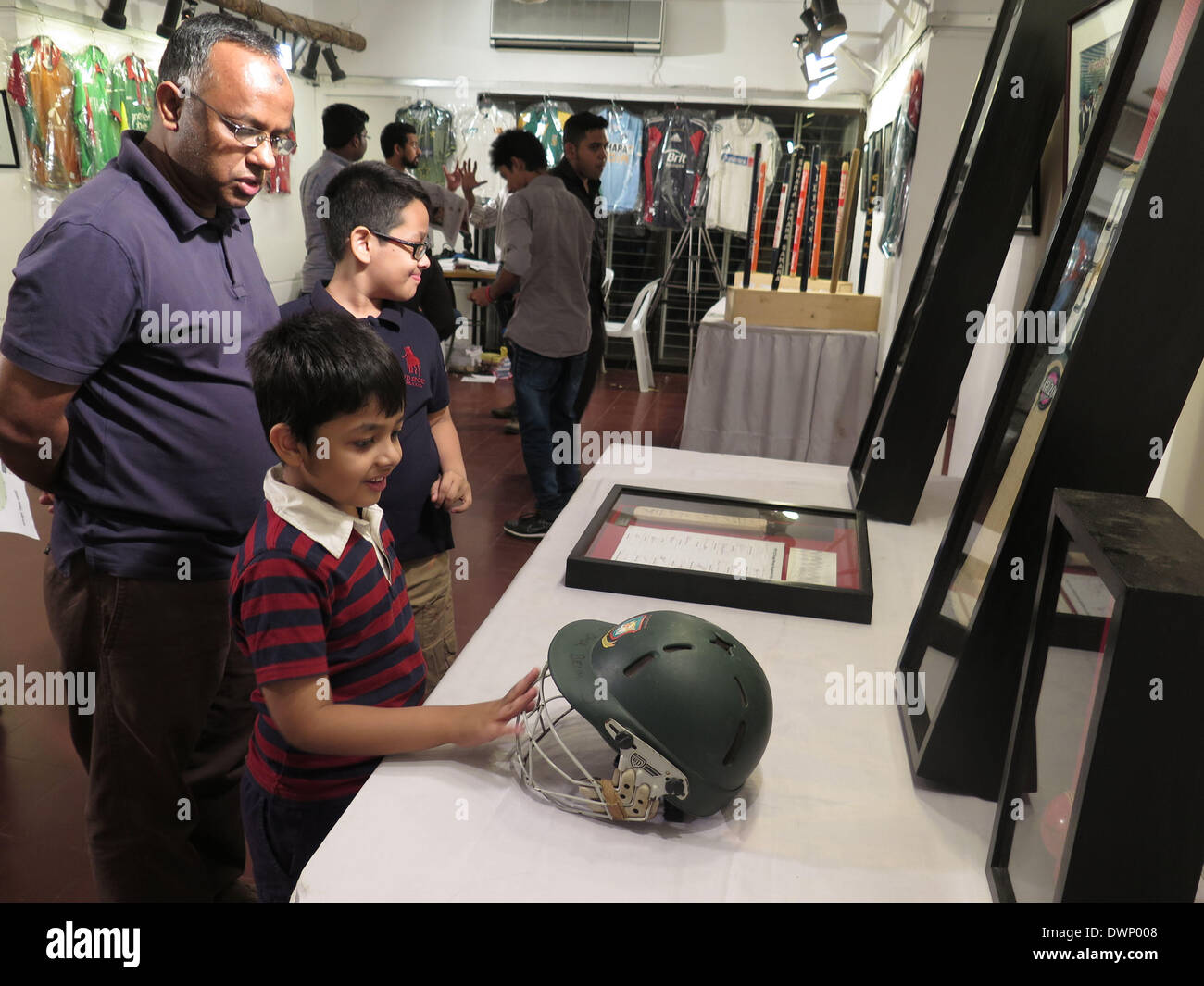 Dhaka, Bangladesh. 12th Mar, 2014. People visit the cricket memorabilia ...