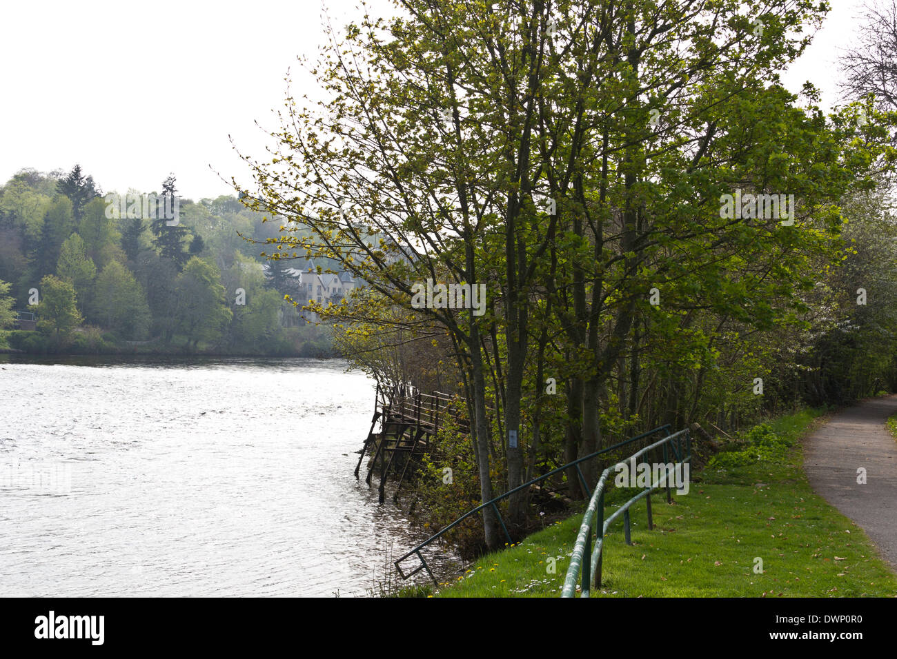 Path on shore of River Ness in Inverness, these being the River Ness ...