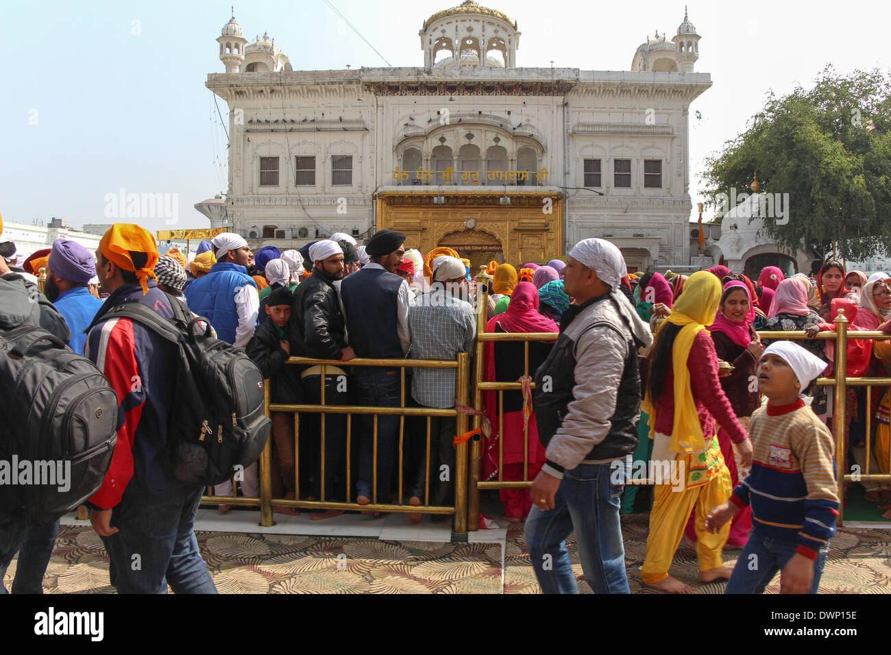 Queue of devotees along with Akal Takht inside the Golden Temple in ...