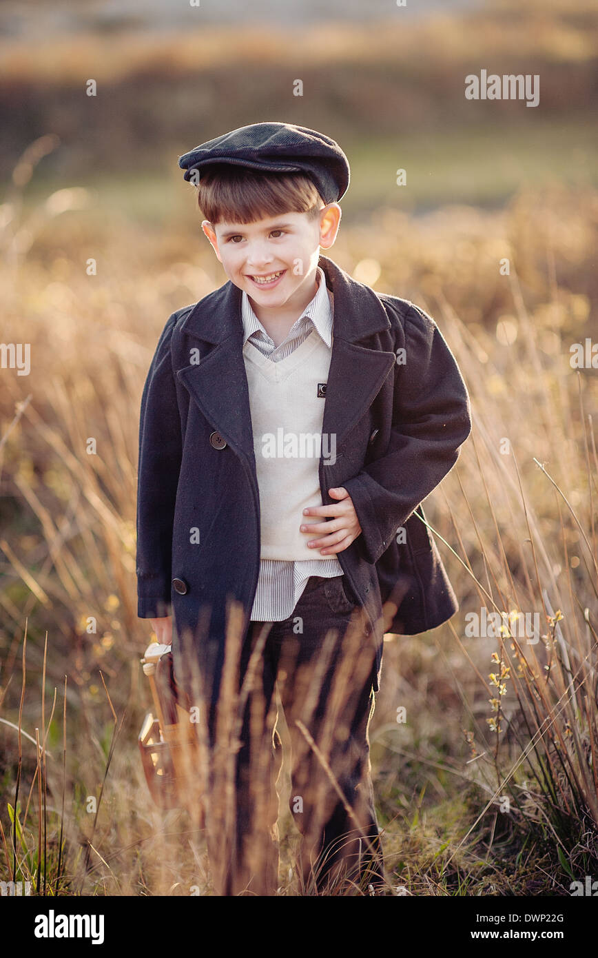Boy looking at sunset hi-res stock photography and images - Alamy