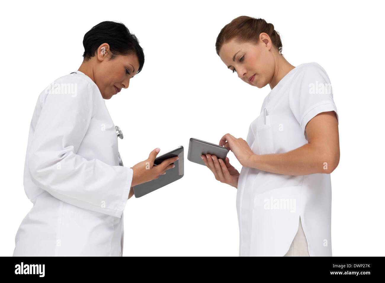 Using tablets Cut Out Stock Images & Pictures - Alamy